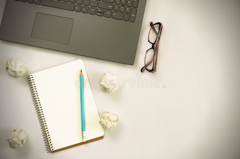 New Ideas Concept. Notebook with Copy Space , Paper Balls, Laptop ...