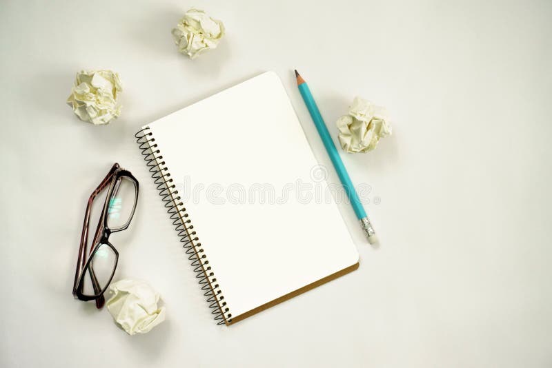 New Ideas Concept. Notebook with Copy Space , Paper Balls, Laptop ...