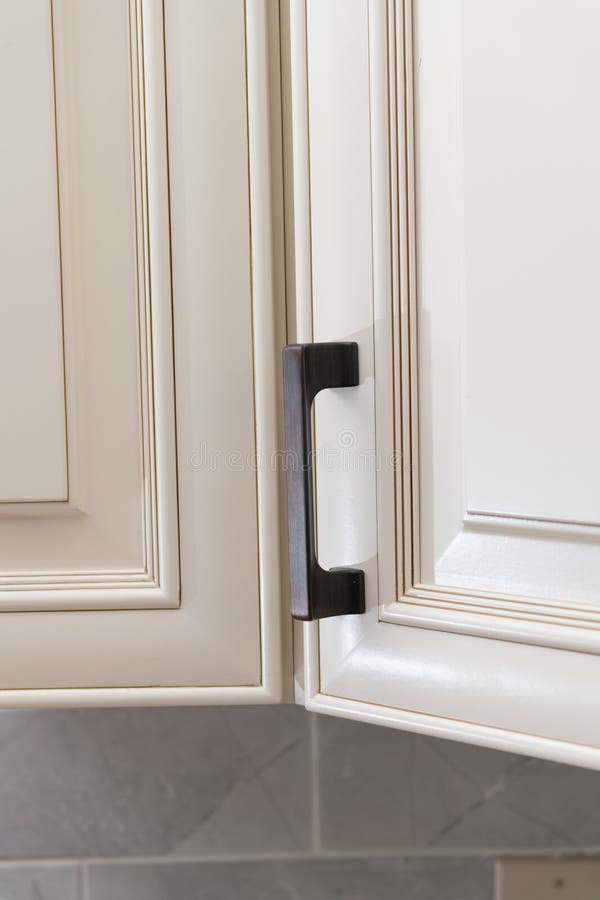 New kitchen cabinet handle stock photo. Image of front - 339717852