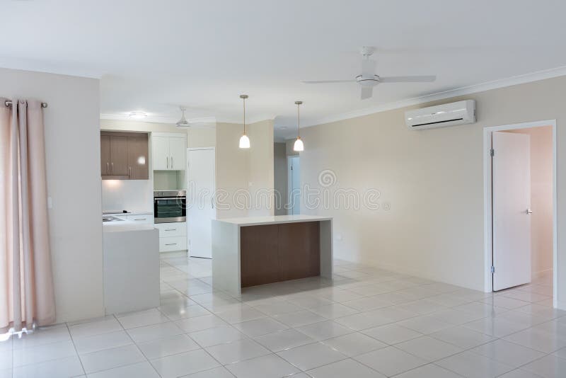 New Kitchen with Granite Bench and Tiled Floor Stock Photo - Image of ...