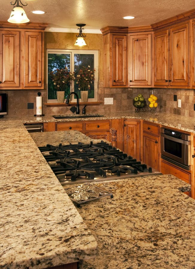 New Kitchen Two Level Center Island Stock Photo - Image of community ...