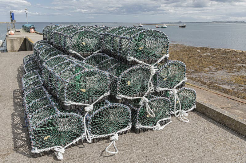 New Lobster Pots Piled Up on a Dock Stock Image - Image of fresh ...