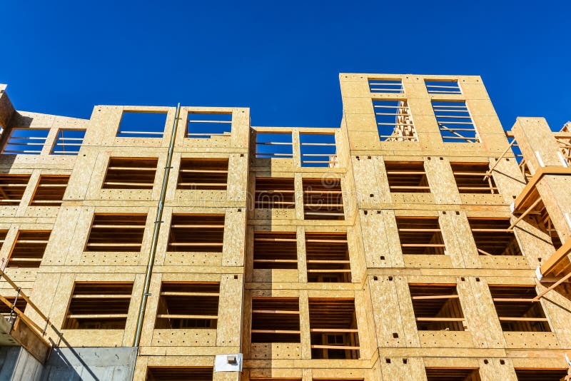 New Low Rise Building Under Construction on Blue Sky Background Stock ...