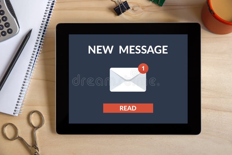 New Message Concept on Tablet Screen with Office Objects Stock Photo ...