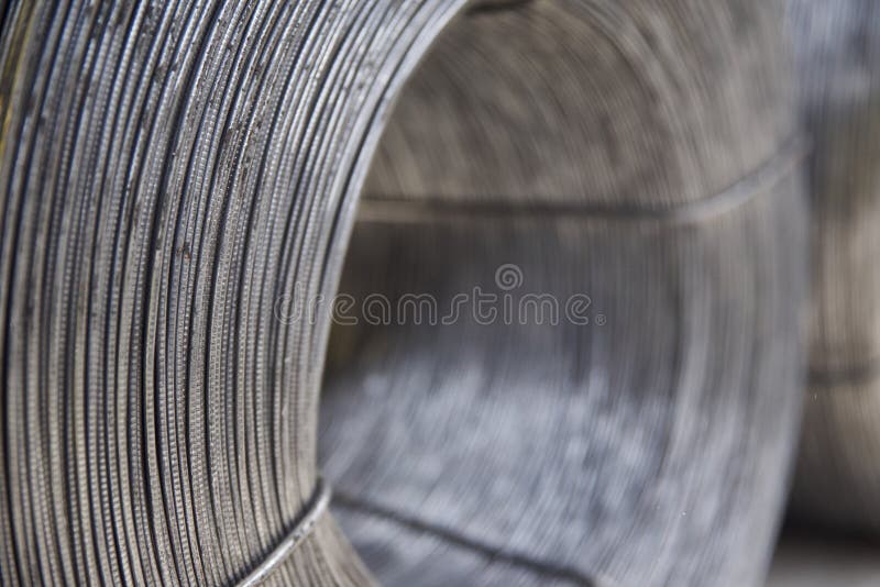 New Metal Wire Wound into Round Coils in Stock Stock Photo - Image of ...