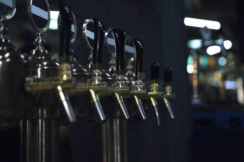 New Modern Beer Taps on Bar Counter Stock Image - Image of metal, draft ...
