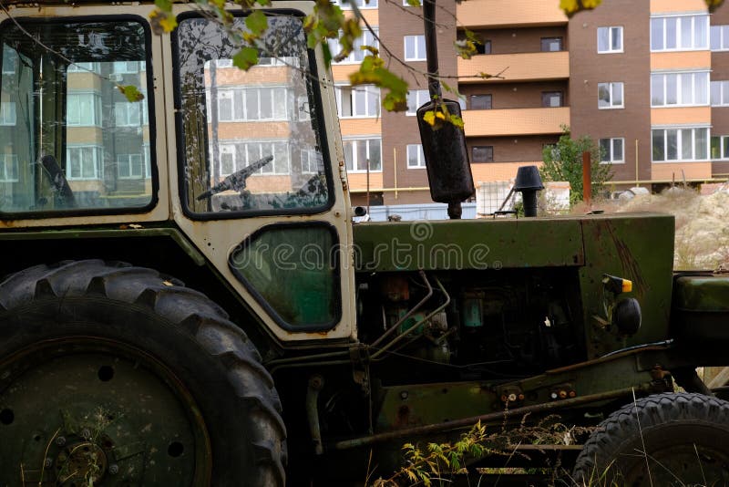 New Modern Building in Process with Vintage Tractor Green Color Stock ...