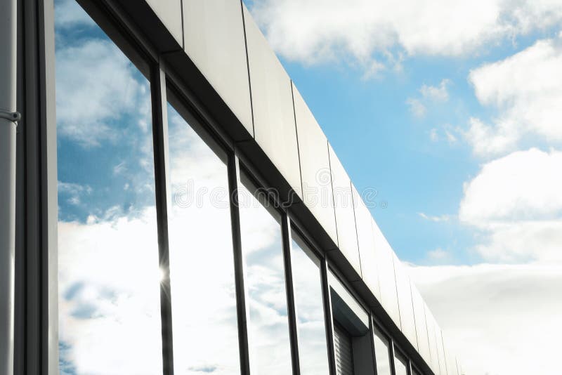 New Modern Building with Tinted Windows Stock Photo - Image of light ...