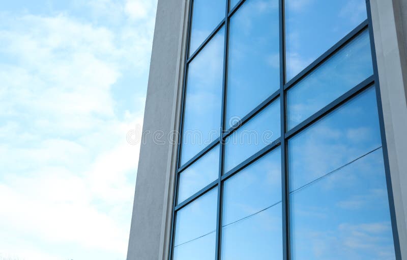 New Modern Building with Tinted Windows Stock Image - Image of ...