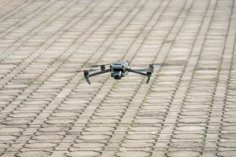 New Modern Drone Close-up. the Quadcopter is on the Ground and Ready ...