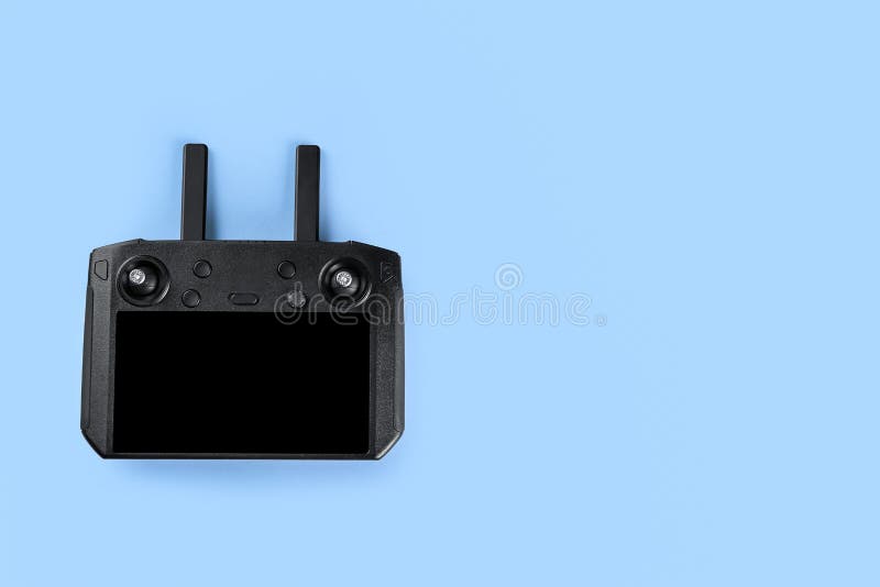 New Modern Drone Controller on Blue Background, Top View. Space for ...
