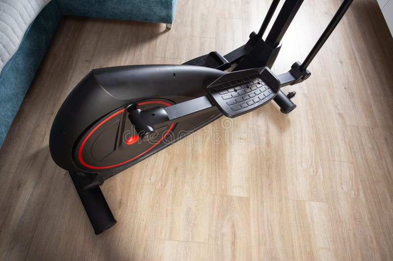 New Modern Elliptical Trainer at Home in the Exercise Room, Close-up ...