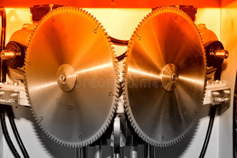 New Modern Industrial Circular Saw Disks. Red Toned Stock Image - Image ...