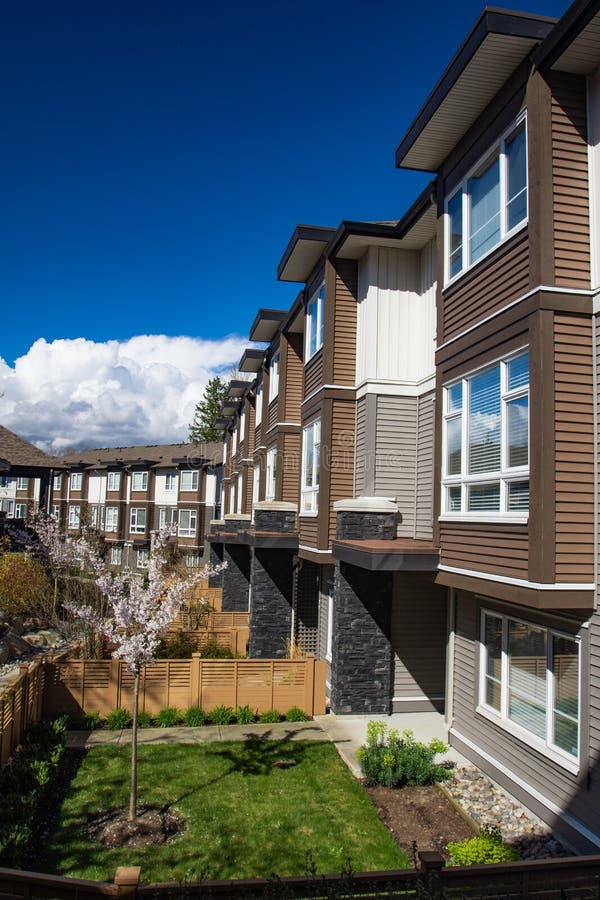 New Modern Low Rise Apartment Complex on a Sunny Spring Day with ...