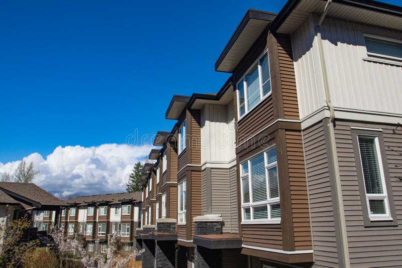 New Modern Low Rise Apartment Complex on a Sunny Spring Day with ...