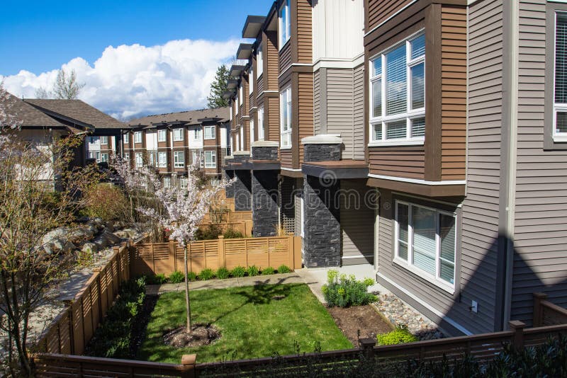 New Modern Low Rise Apartment Complex on a Sunny Spring Day with ...