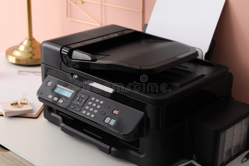 New Modern Printer with Paper on White Table at Workplace Stock Photo ...