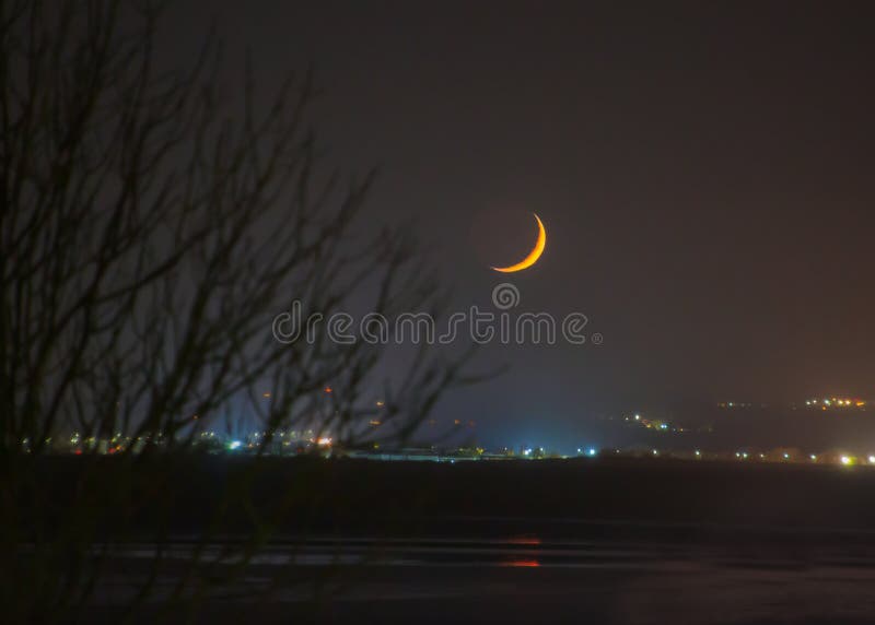 New Moon Setting Over Sandwich Bay, Kent. Stock Photo - Image of serene ...