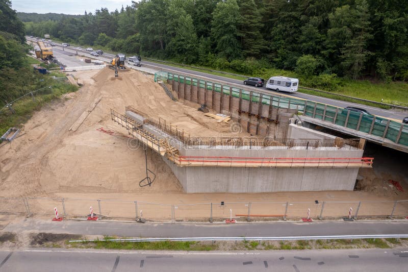 A New Motorway Bridge is Being Built Next To a Motorway Stock Photo ...