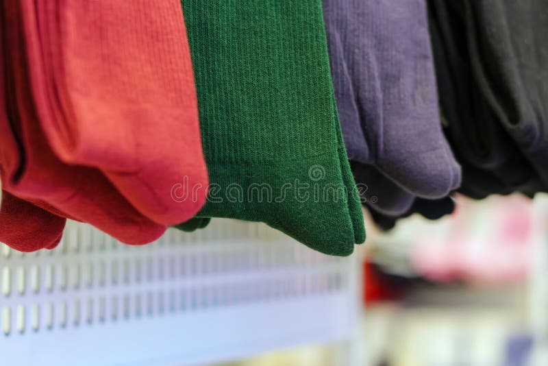 New Multi-colored Socks Hang on a Hanger in a Row Stock Photo - Image ...