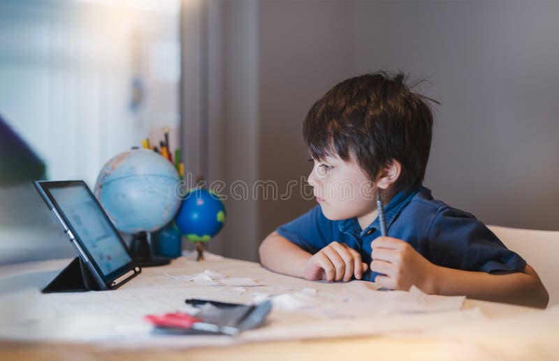 New Normal Life Kid Using Tablet for His Homework,Child Boy Doing ...