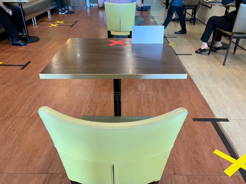 New Normal Red Cross Sign on Dining Table To Make Social Distancing for ...