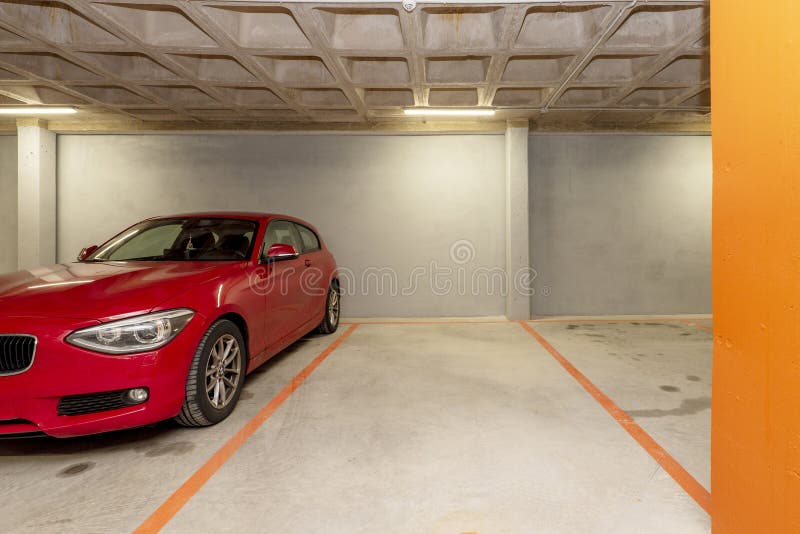 A New Office Building Garage with Orange Columns Stock Photo - Image of ...