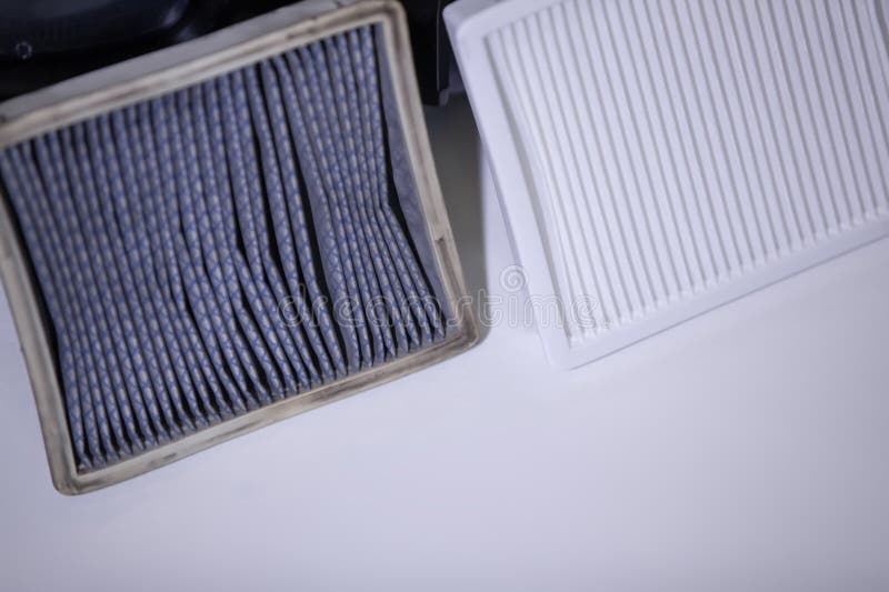 New and Old White Square Dust Filter for Vacuum Cleaner. Close-up Stock ...