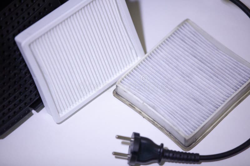 New and Old White Square Dust Filter for Vacuum Cleaner. Replacing a ...