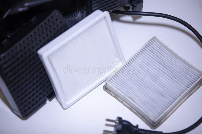 New and Old White Square Dust Filter for Vacuum Cleaner. Replacing a ...