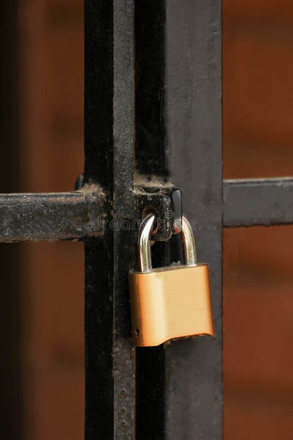 A New Padlock on Old Wrought Iron Gate. Stock Image - Image of white ...