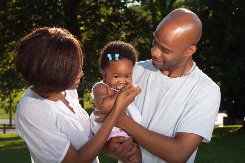 New parents stock image. Image of posing, father, infant - 10365629