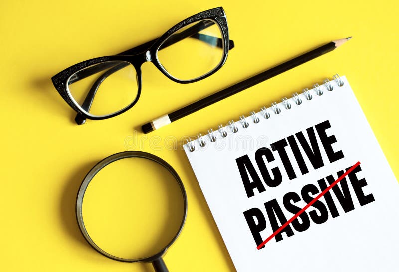 ACTIVE. Text on Office Desk with Calculator, Markers, Glasses and ...