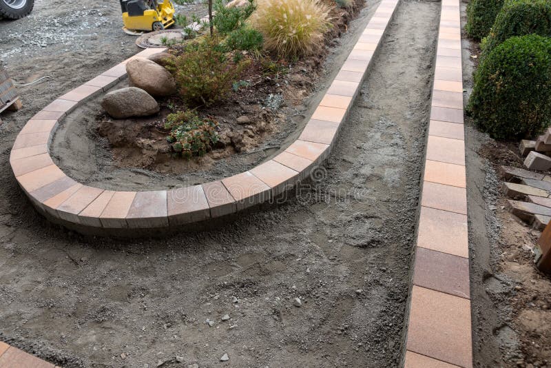 New Paving Stones for the Footpath Stock Image - Image of green ...