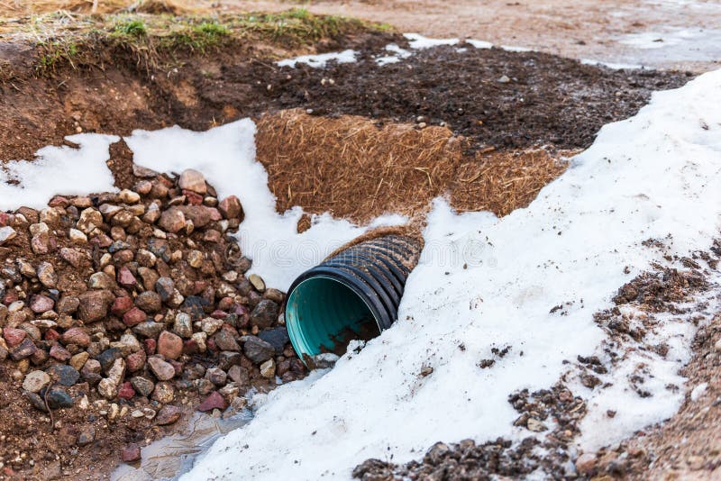 A New Plastic Culvert Has Been Inserted into the Ditch Stock Photo ...