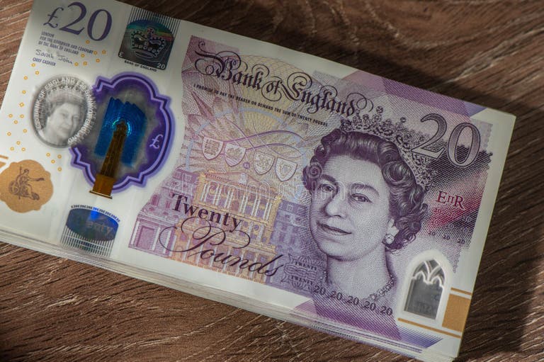British Currency - 20 Pound Banknotes in a Spreading Editorial ...