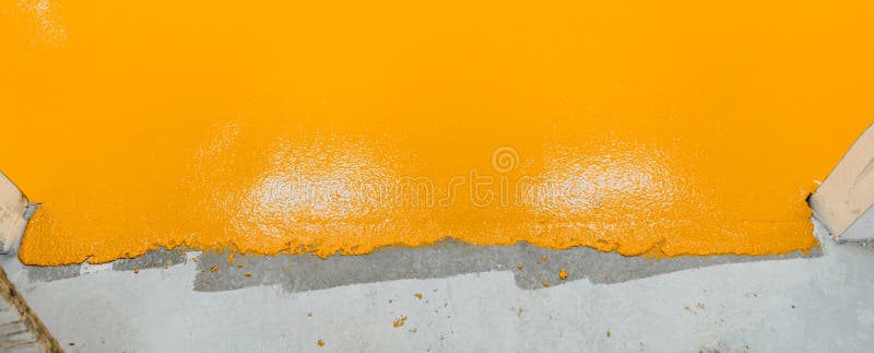 New Polished Concrete Floor Covered with a Layer of Yellow Epoxy Resin ...