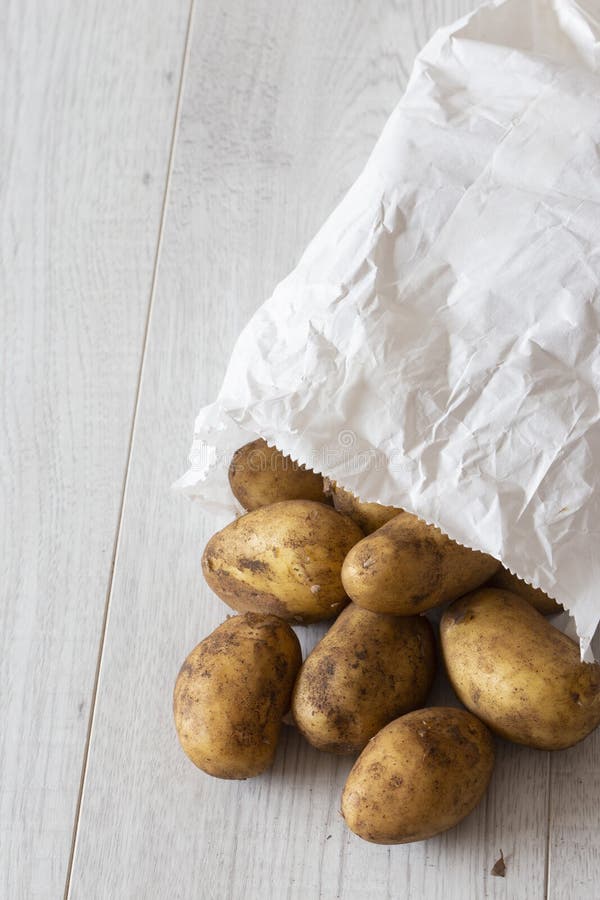 New Potatoes in a White Paper Bag, Environmentally Friendly ...