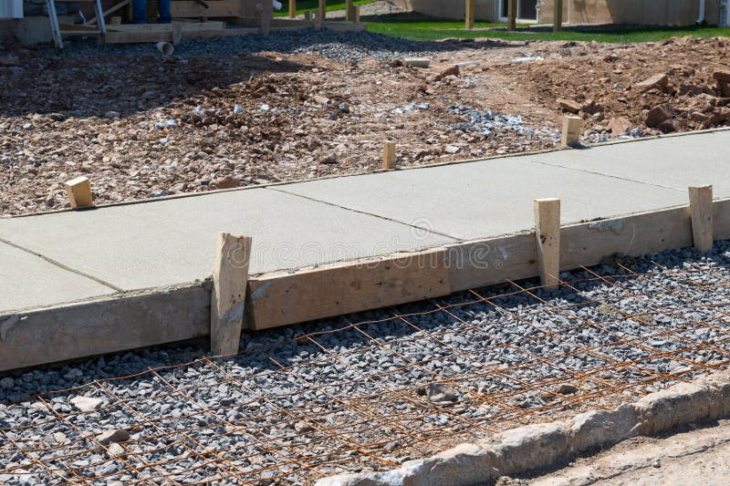 New poured cement sidewalk stock photo. Image of road - 307589936