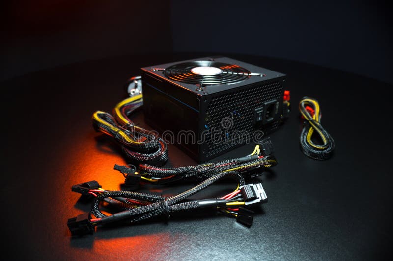 A New Powerful Computer Power Supply and a Set Stock Image - Image of ...