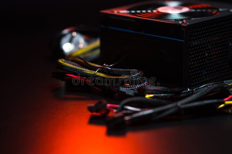 A New Powerful Computer Power Supply and a Set Stock Image - Image of ...