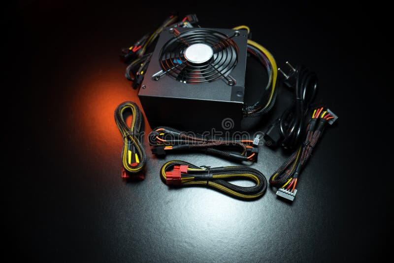A New Powerful Computer Power Supply and a Set Stock Image - Image of ...