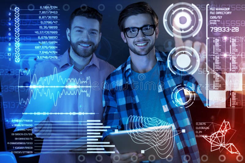 Cheerful Programmers Touching Transparent Screen Stock Photo - Image of ...