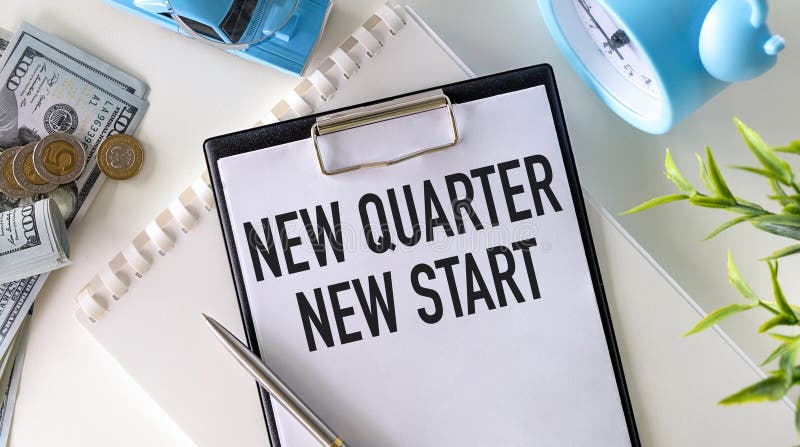 NEW QUARTER NEW START Text Written on a Paper Clipboard with Office ...