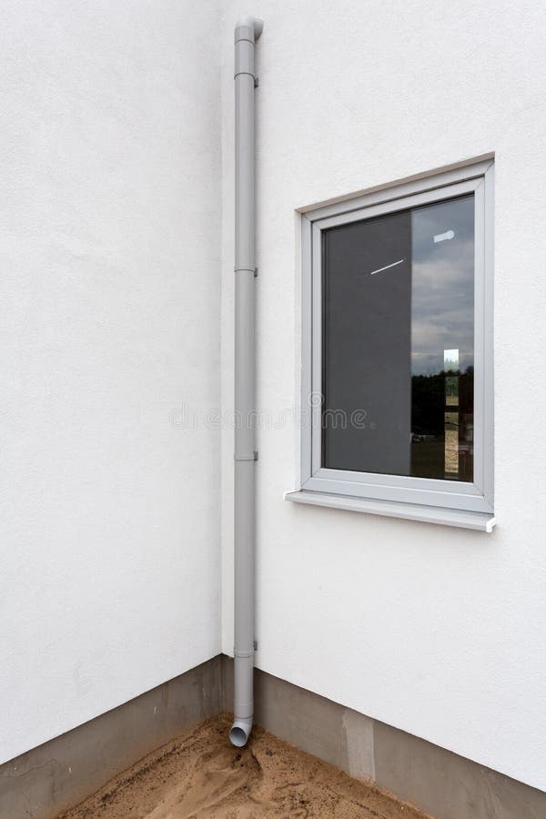 New Rain Gutter on a White Wall with Window Stock Image - Image of ...