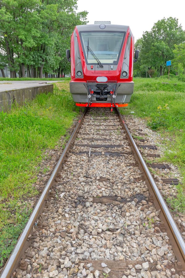 Commuter Train Rails stock photo. Image of transportation - 211241594