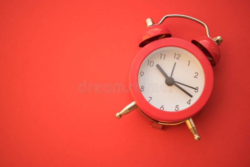 New Red Round Clock on Red Table, Copy Space Stock Photo - Image of ...