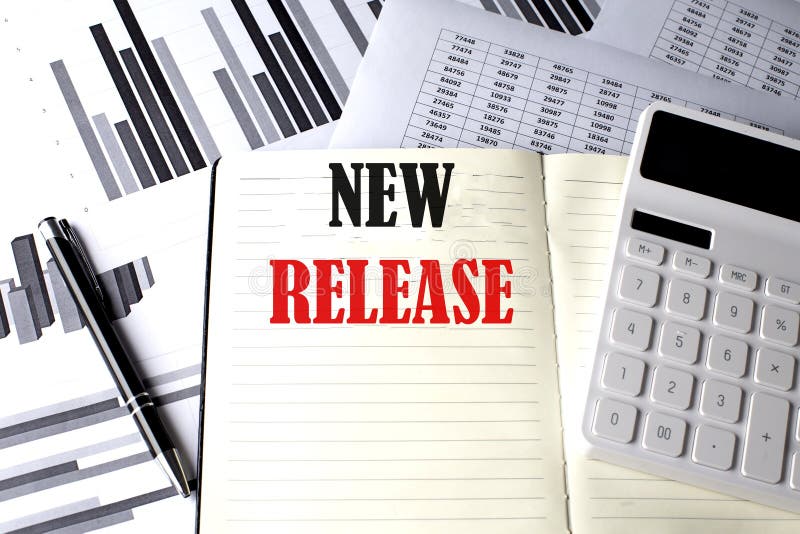 NEW RELEASE Text Written on a Notebook on Chart and Diagram Stock Image ...