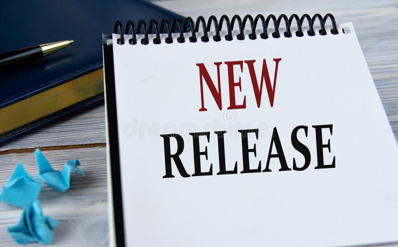 NEW RELEASE - Words in a Notebook on the Background of a Weekly and a ...