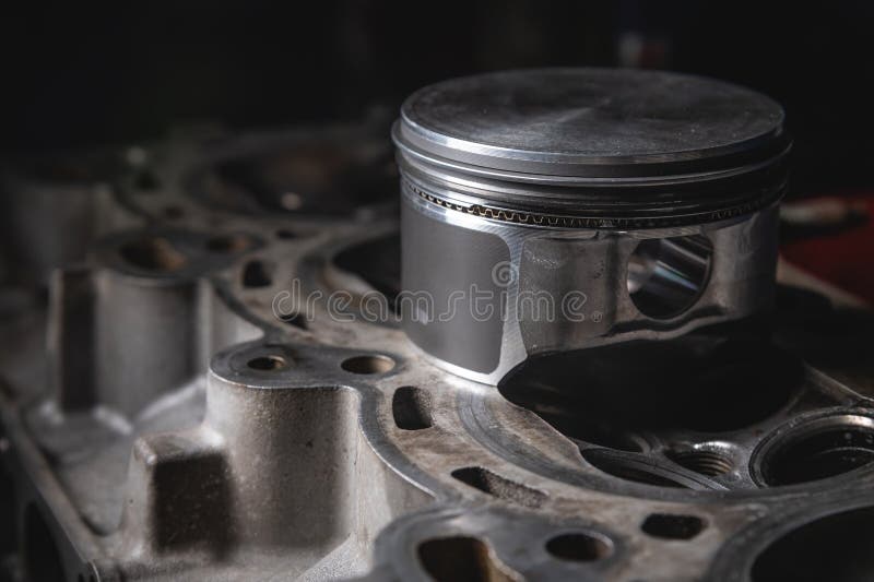 A New Repair Piston of the Internal Combustion Engine Lies on a ...